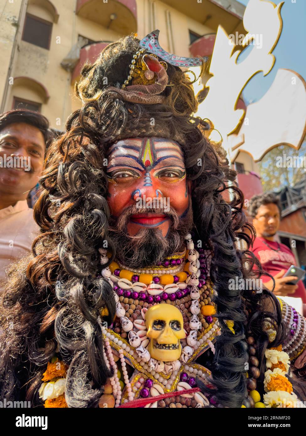 Masan Holi, Portrait of an male artist with painted face act as lord ...