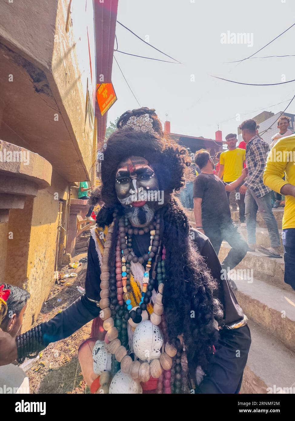 Masan Holi, Portrait of an male artist with painted face act as lord ...