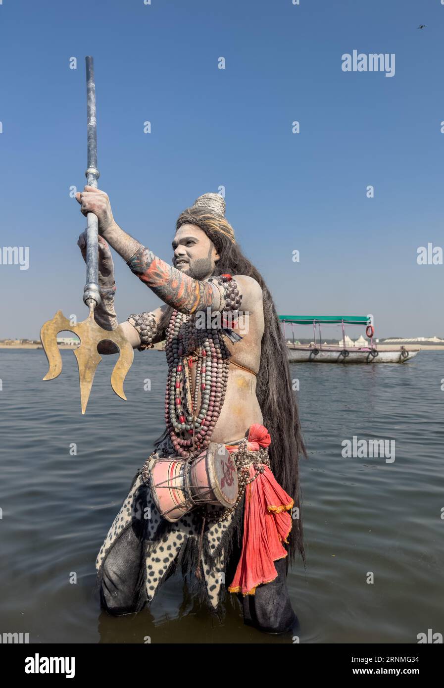 Masan Holi, Portrait of an male artist with painted face act as lord ...