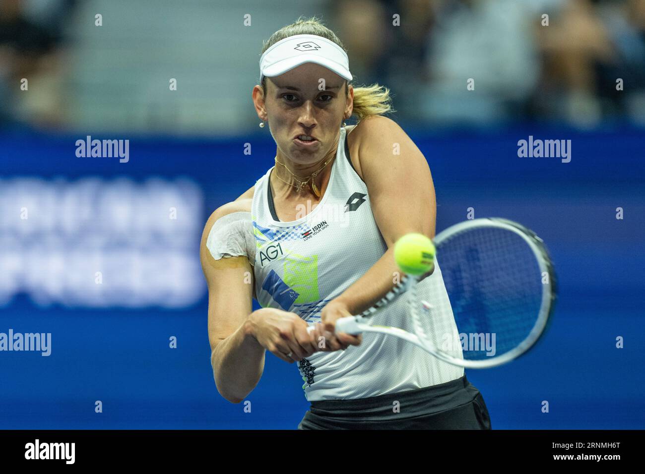 Elise Mertens of Belgium returns ball during 3rd round against Coco ...