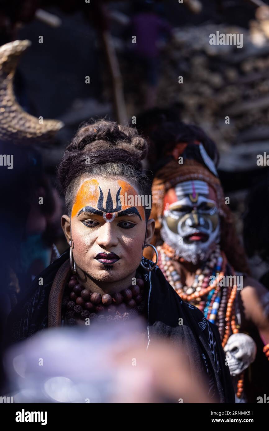 Masan Holi, Portrait of an male artist with painted face act as lord ...