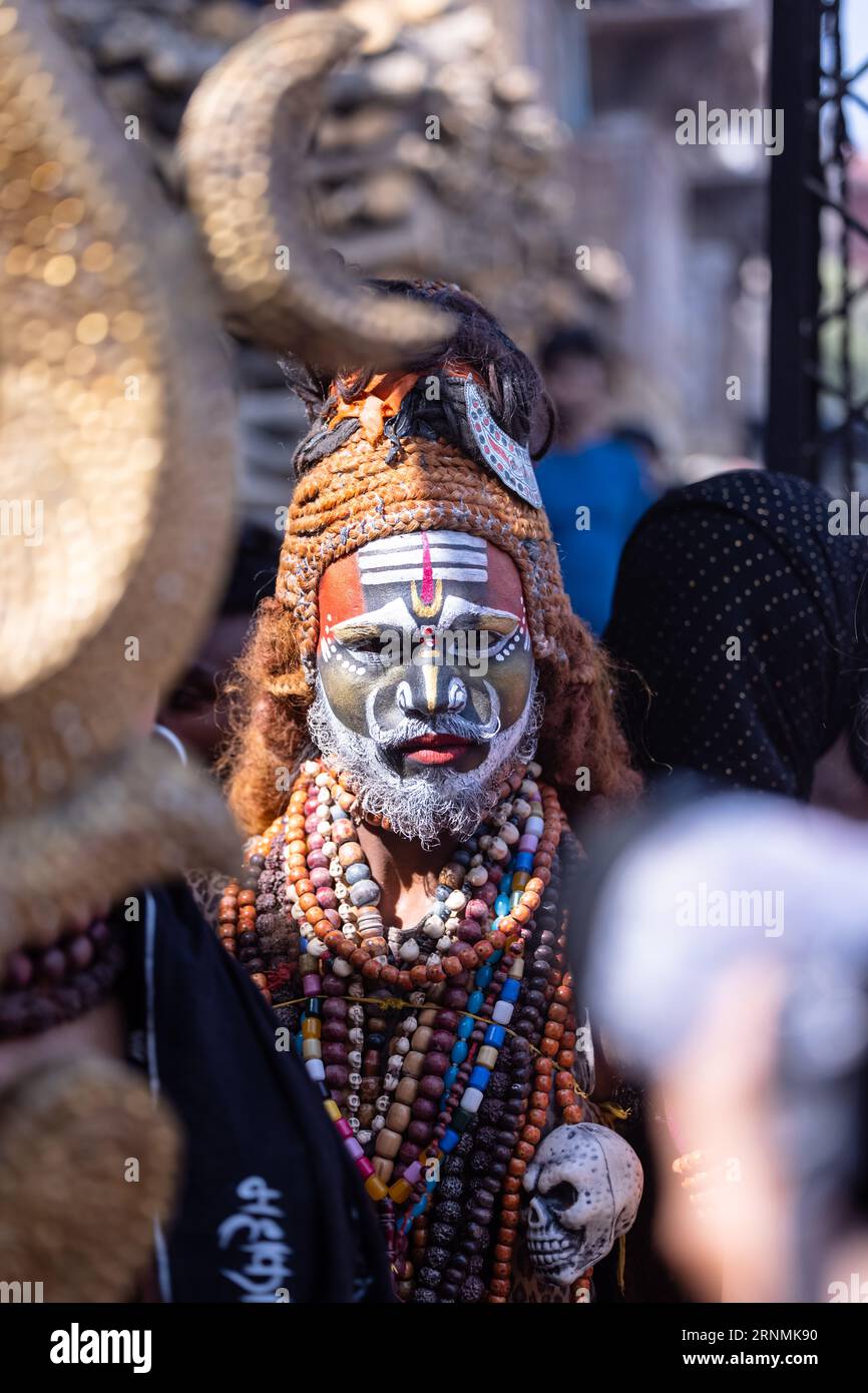 Masan Holi, Portrait of an male artist with painted face act as lord ...