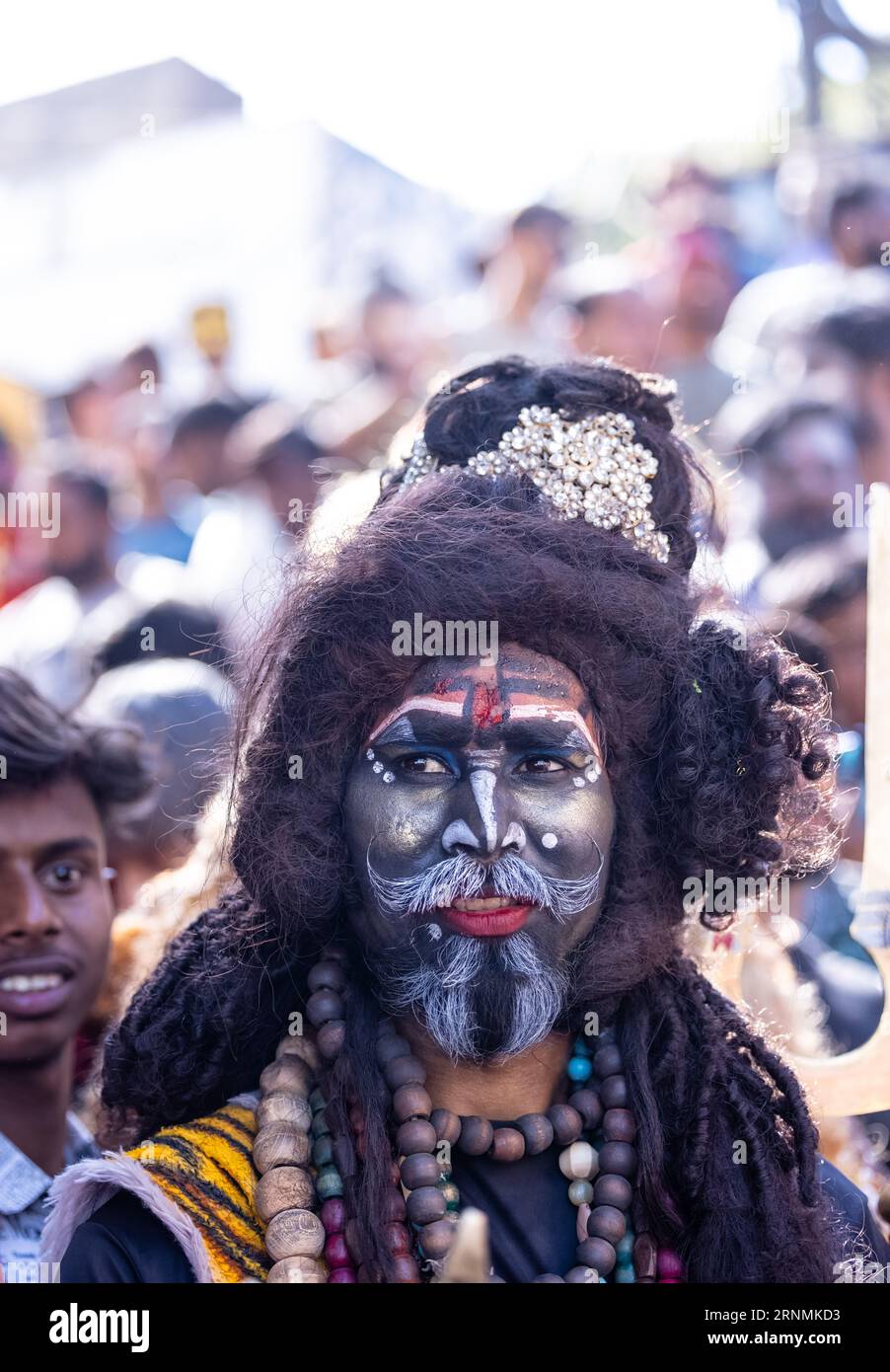 Masan Holi, Portrait of an male artist with painted face act as lord ...