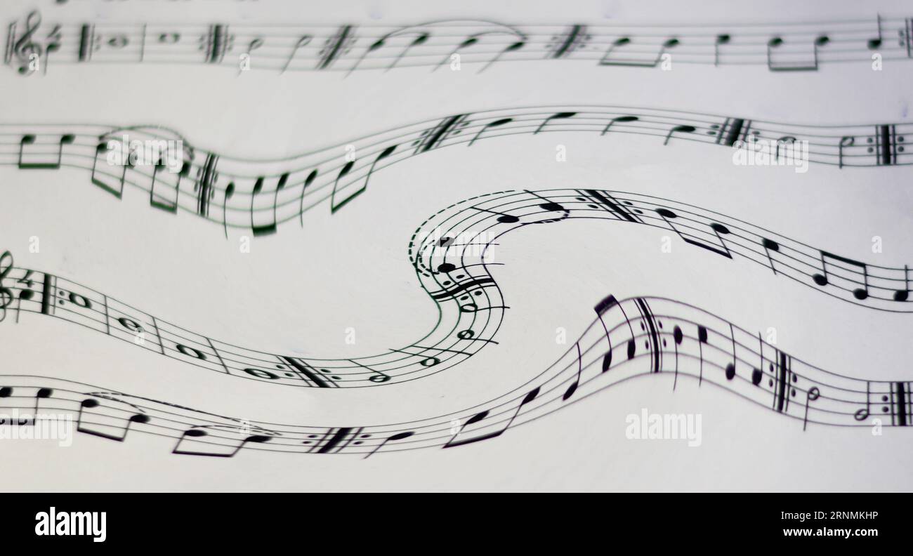 crazy musical notes on a white sheet of paper Stock Photo - Alamy