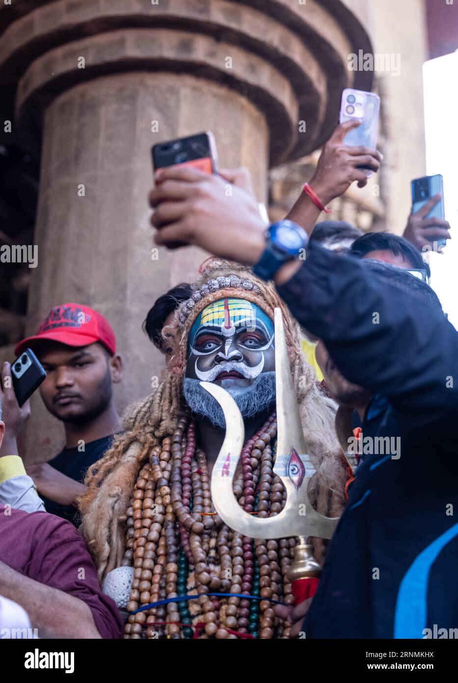 Masan Holi, Portrait of an male artist with painted face act as lord ...