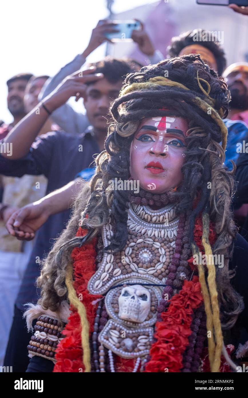 Masan Holi, Portrait of an male artist with painted face act as lord ...