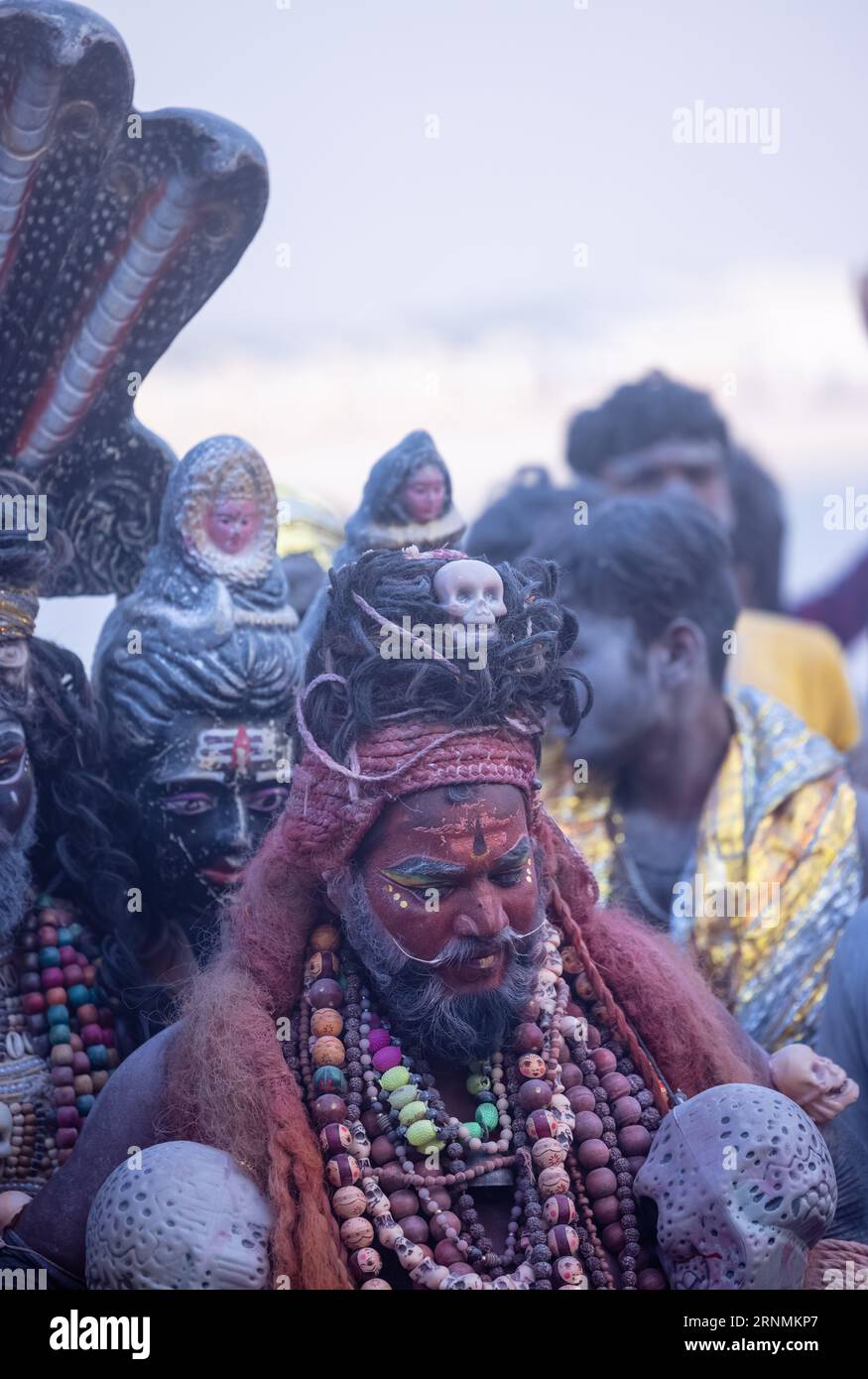 Masan Holi, Portrait of an male artist with painted face act as lord ...