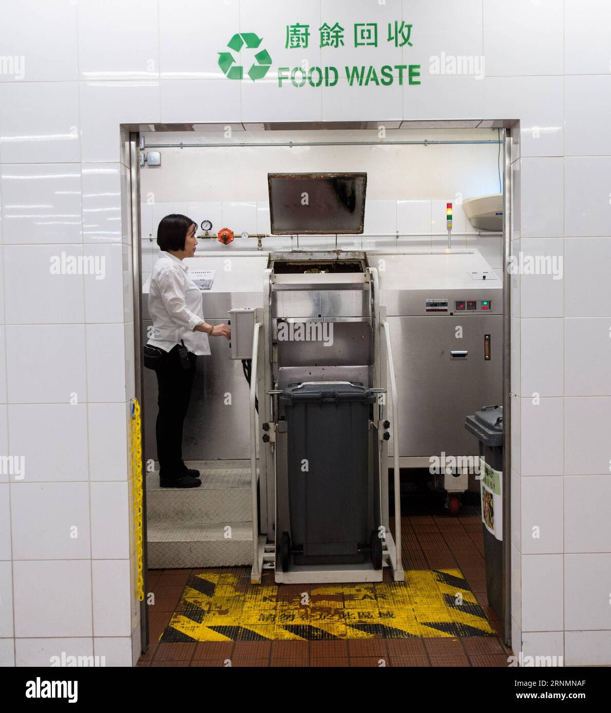 (170605) -- MACAO, June 5, 2017 -- A working staff operates a food ...
