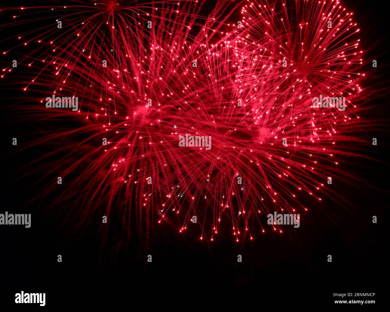 colorful fiery sparks from huge fireworks during night celebrations ...