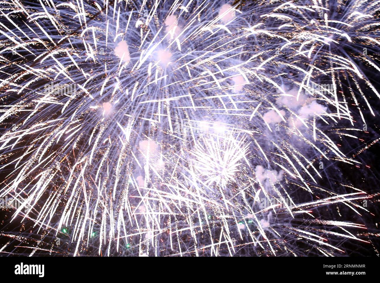 colorful explosions of huge fireworks during the festivities at night ...