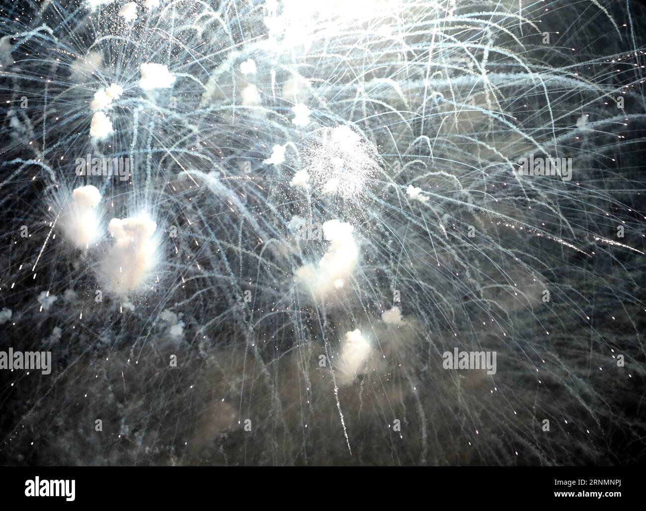 colorful fiery sparks from huge fireworks during night celebrations ...