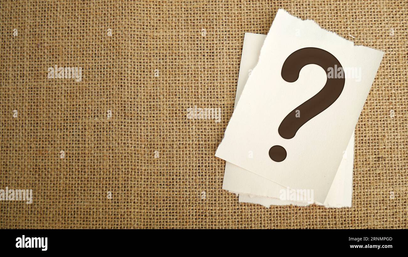 Question mark heap on the burlap. Concept for confusion, question or ...