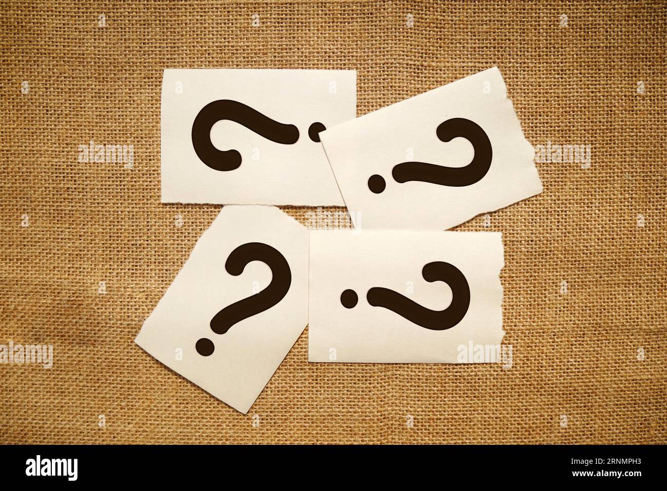 Question mark heap on the burlap. Concept for confusion, question or ...