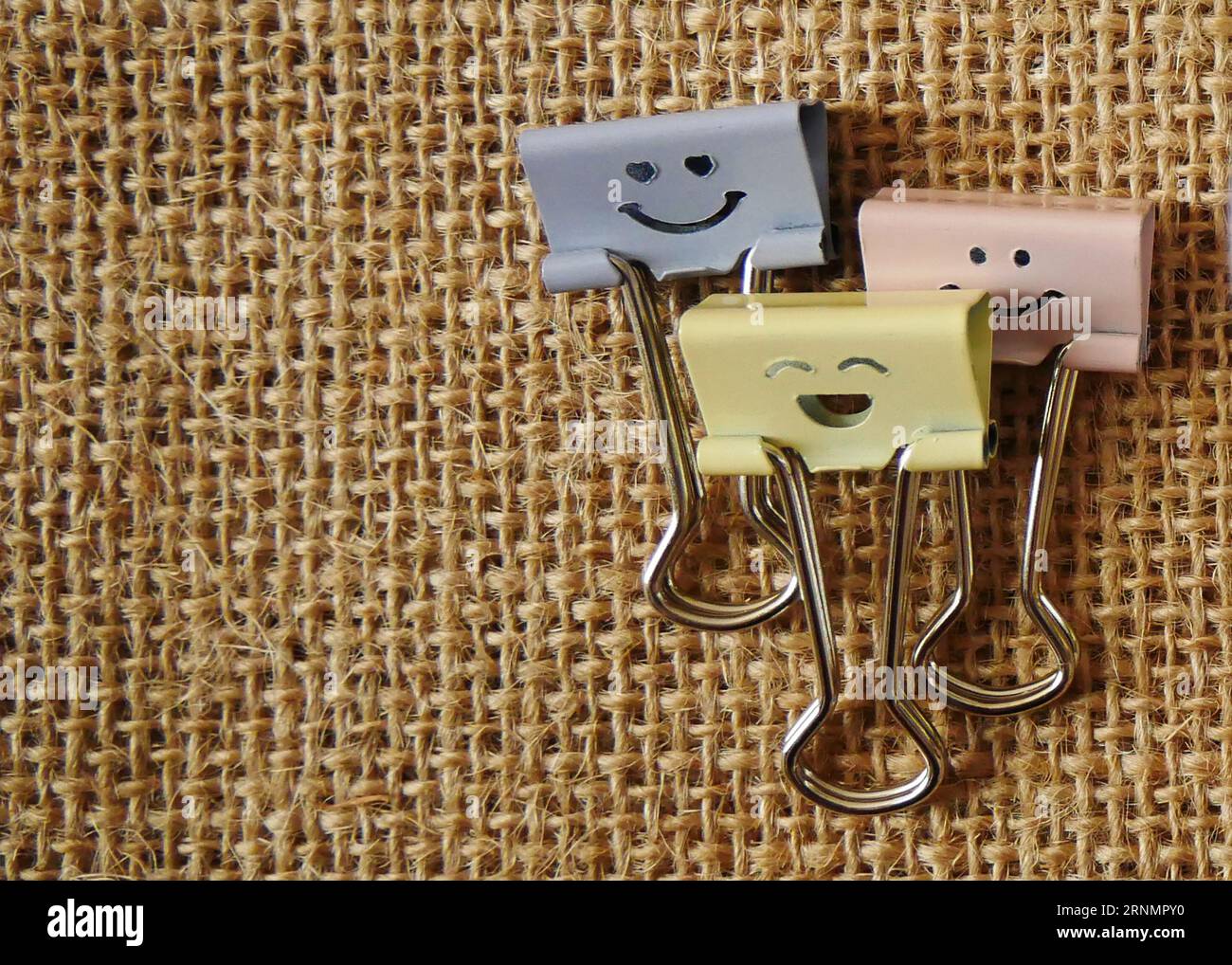 Pastel colored Office Paper Clips, Smiley Binder Clips, and Pencils on ...
