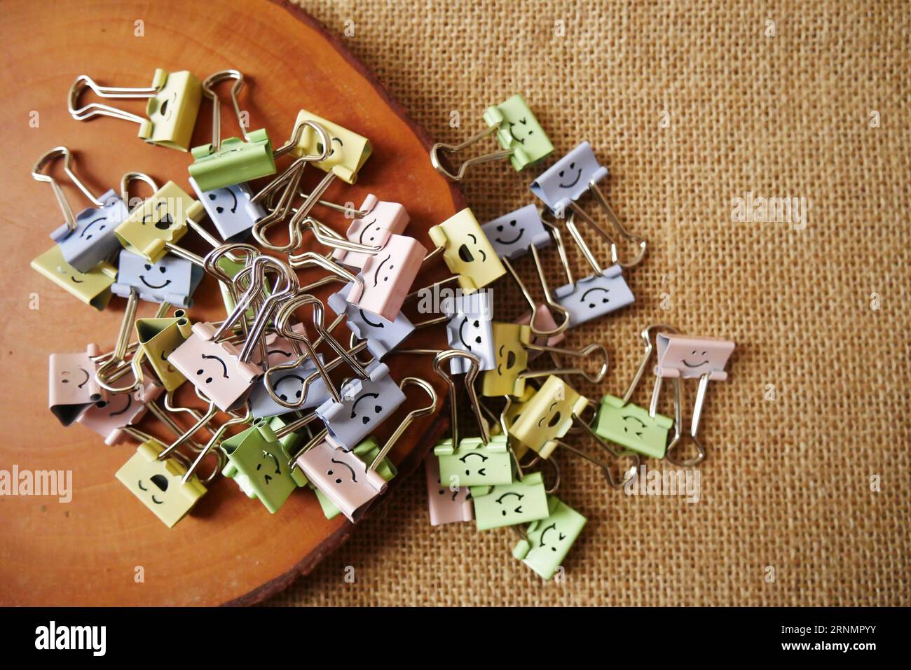 Pastel colored Office Paper Clips, Smiley Binder Clips, and Pencils on ...