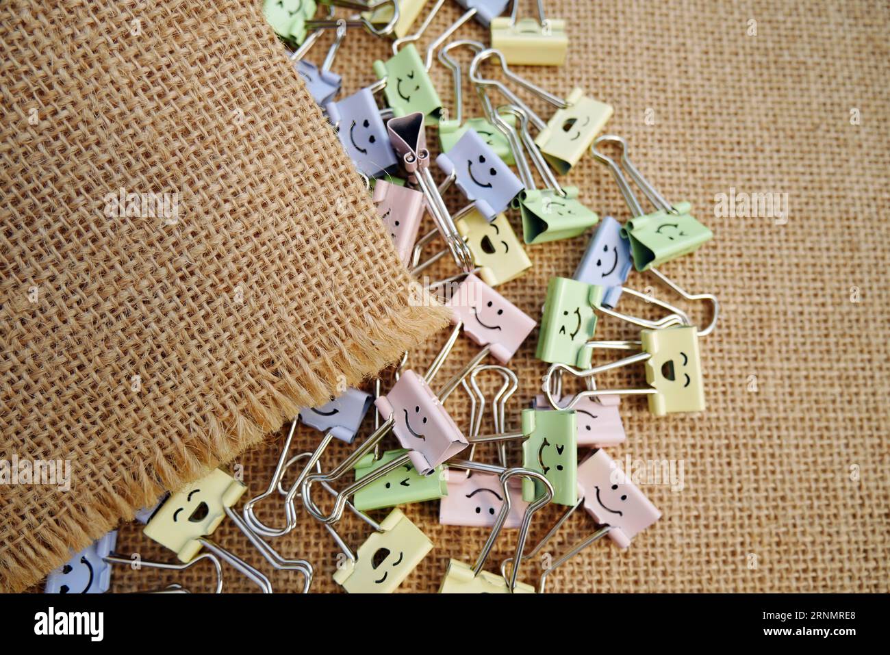 Pastel colored Office Paper Clips, Smiley Binder Clips, and Pencils on ...