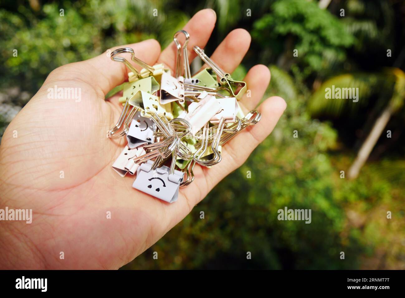 Pastel colored Office Paper Clips, Smiley Binder Clips, and Pencils on ...