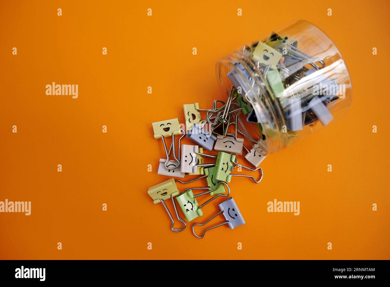 Pastel colored Office Paper Clips, Smiley Binder Clips, and Pencils on ...