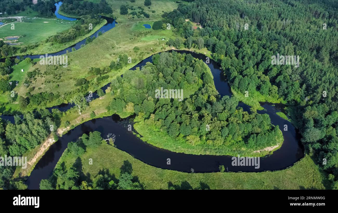 Aerial view of the bends and loops of the Merkys river in Lithuania ...