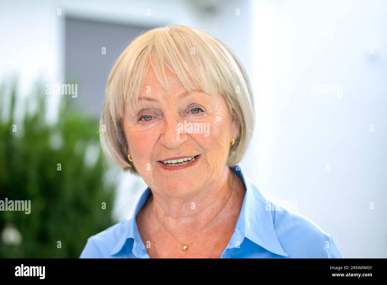 Frontal portrait of a very attractive older woman in her eighties ...