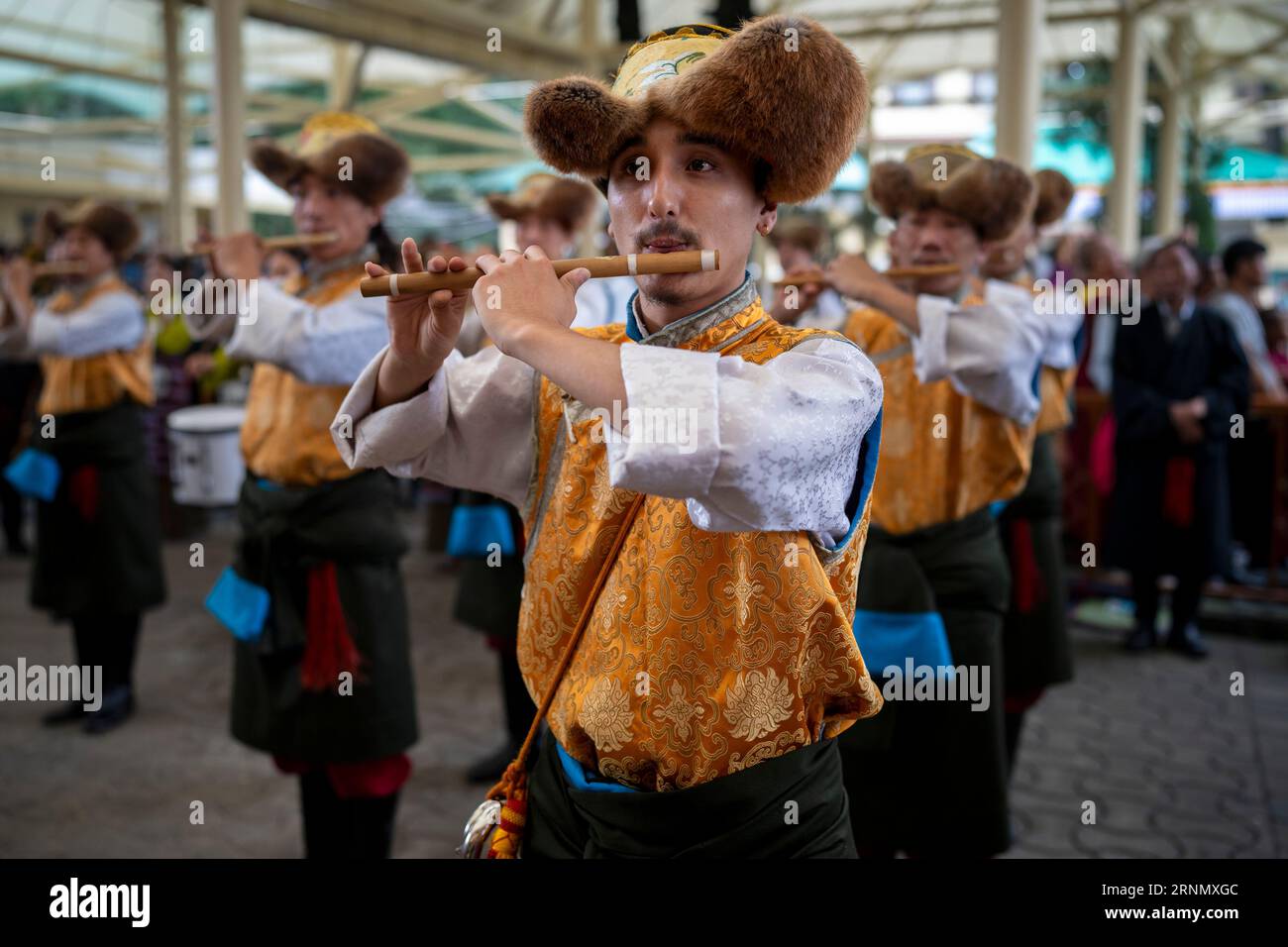 Exile Tibetan artists play the Tibetan national anthem during the 63rd ...