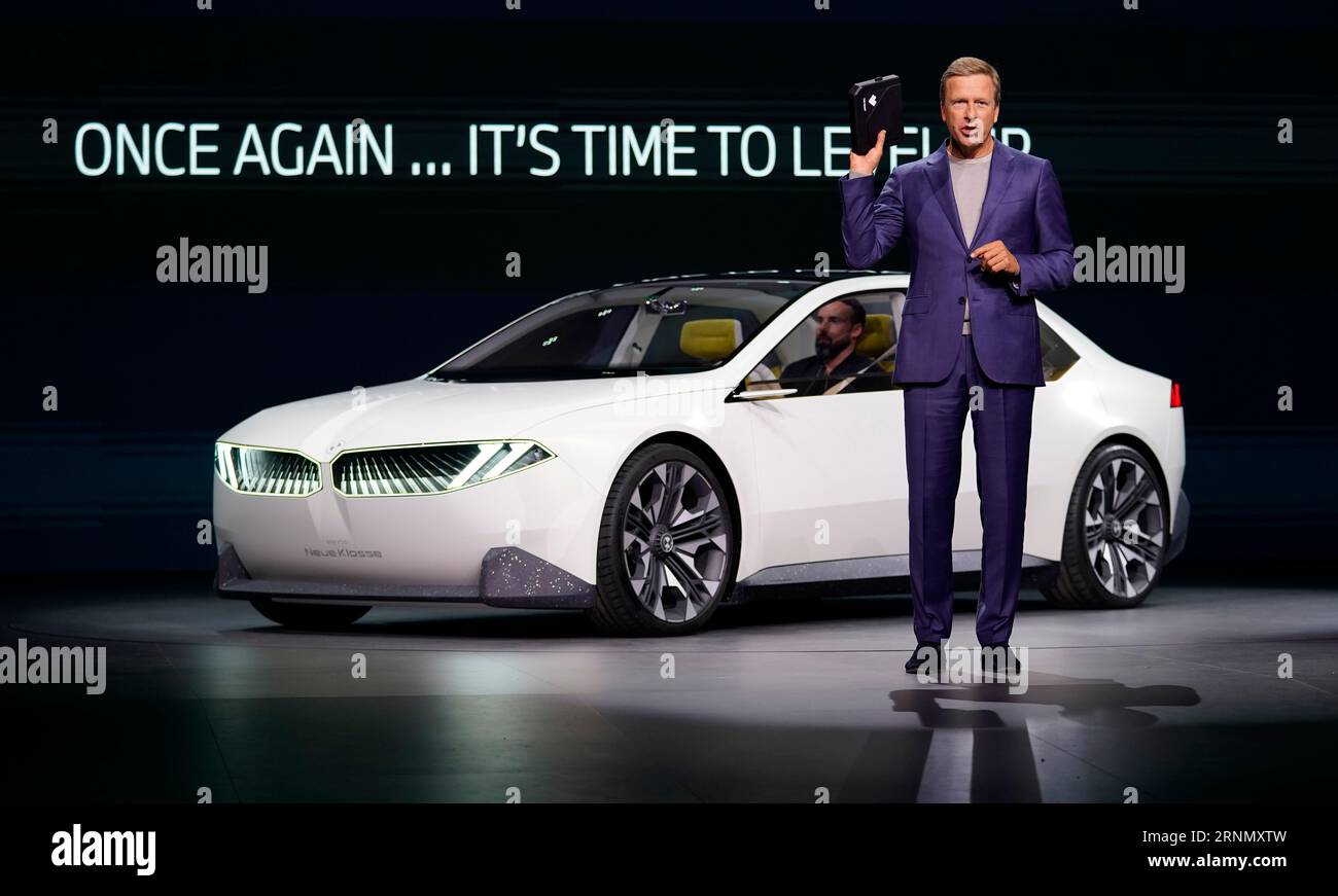 Munich, Germany. 02nd Sep, 2023. BMW CEO Oliver Zipse holds the vehicle's control system during ...