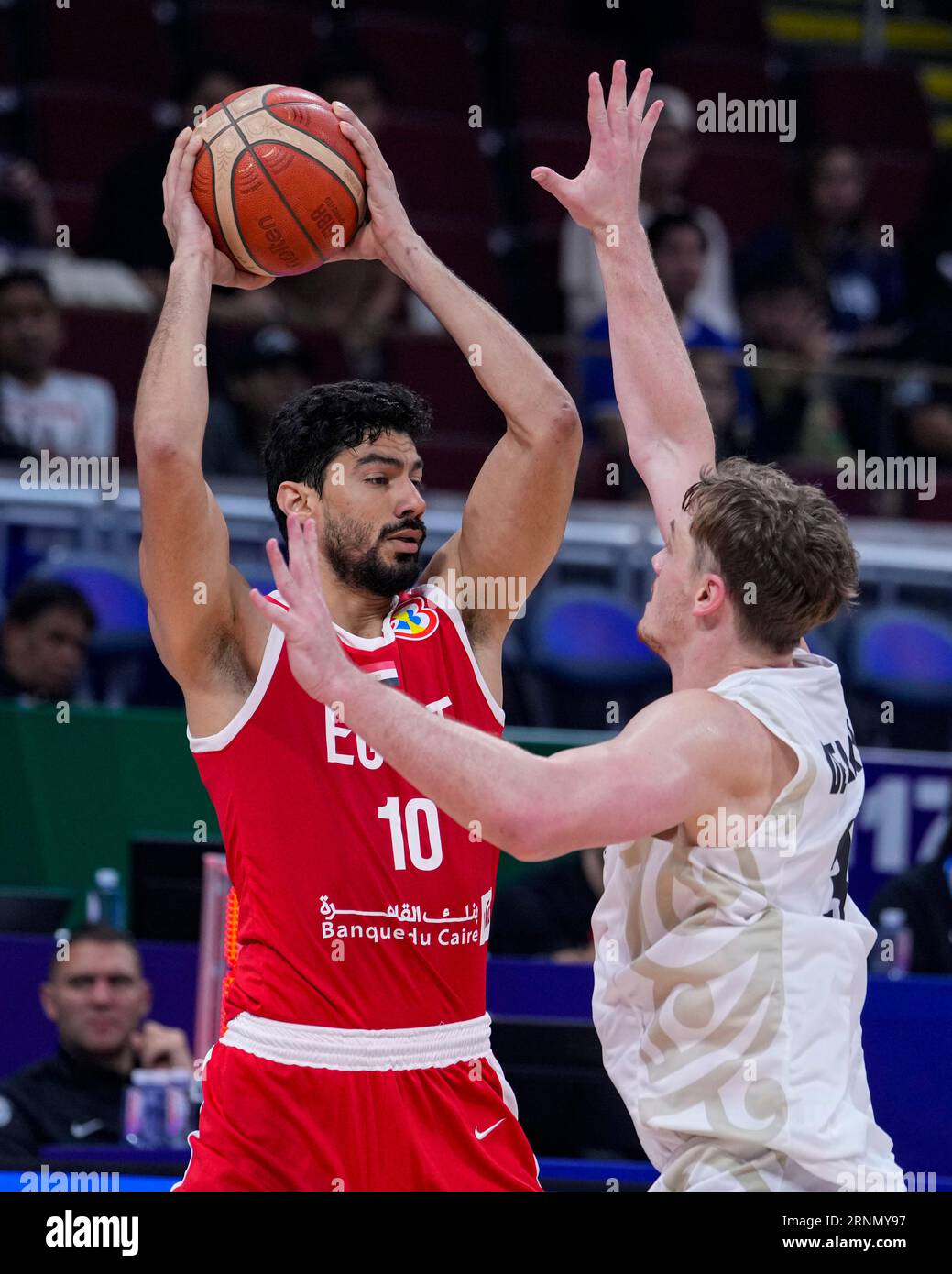Egypt forward Anas Mahmoud (10) looks to pass over New Zealand forward ...