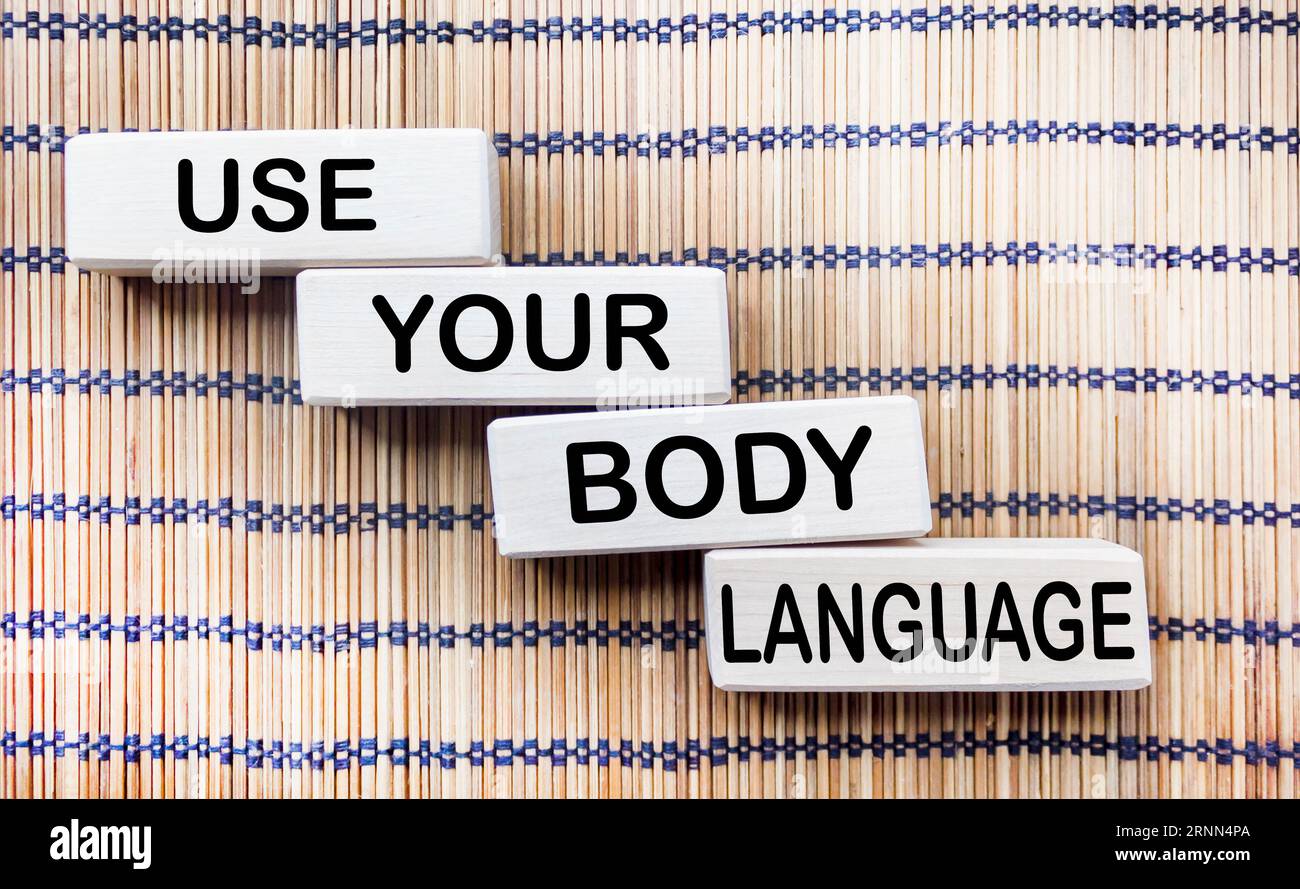 Use body language character. Concept words. Use body language on wooden ...