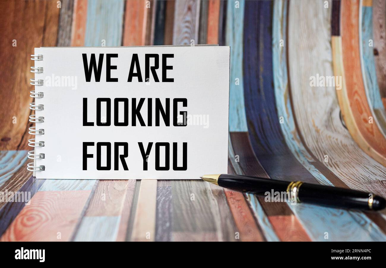 Notepad with the words We are looking for you. Beautiful background ...