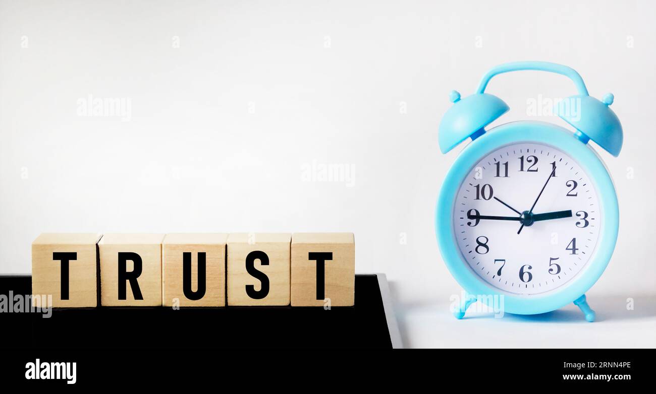 Symbol of trust. Concept word Trust on wooden cubes. Beautiful ...