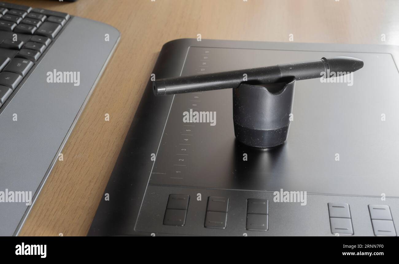 Close-up of office equipment on a desk made of wood-like material Stock ...