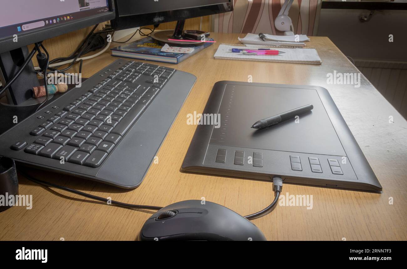 Close-up of office equipment on a desk made of wood-like material Stock ...