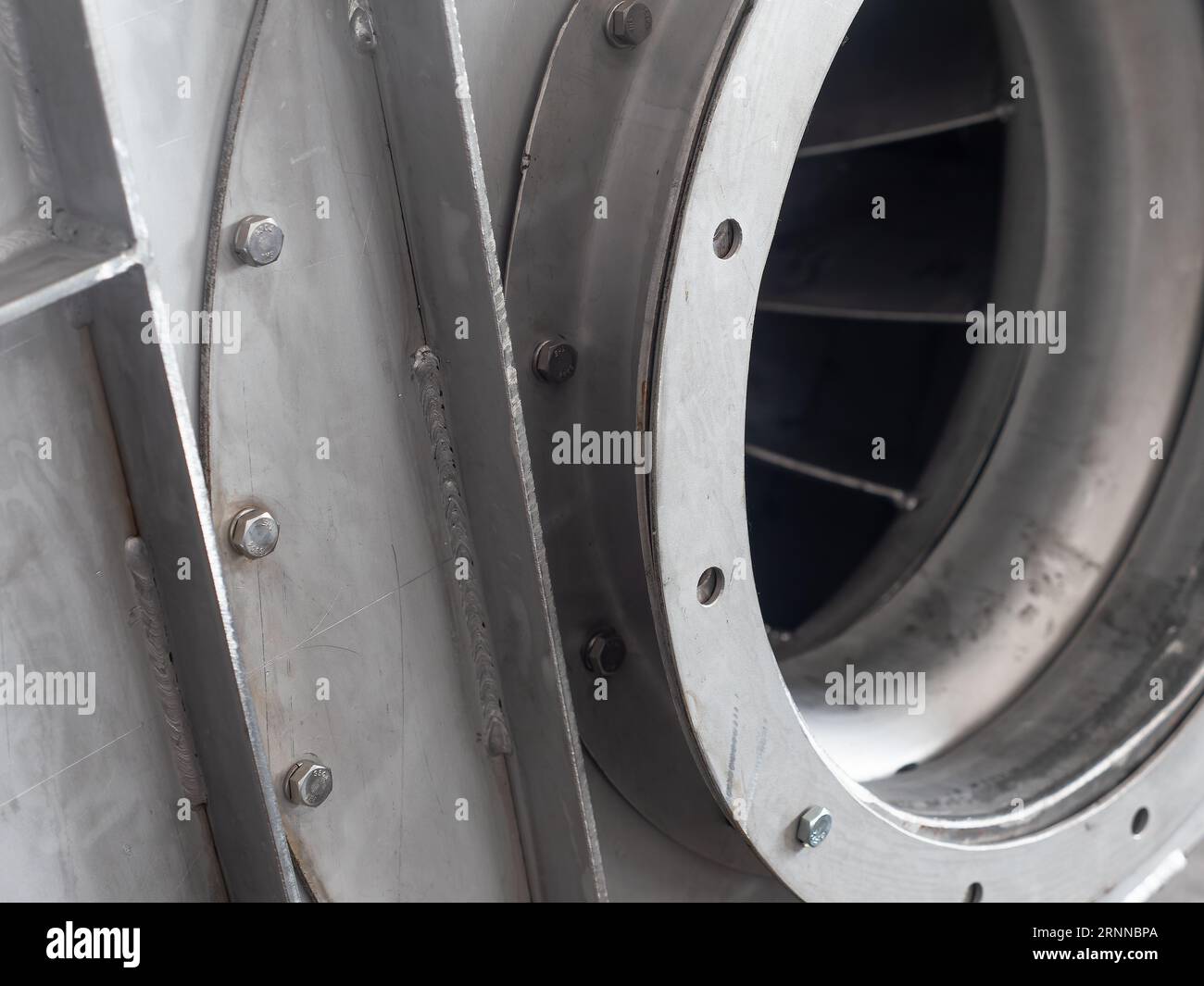 Closeup detail of stainless steel centrifugal fan during production at ...