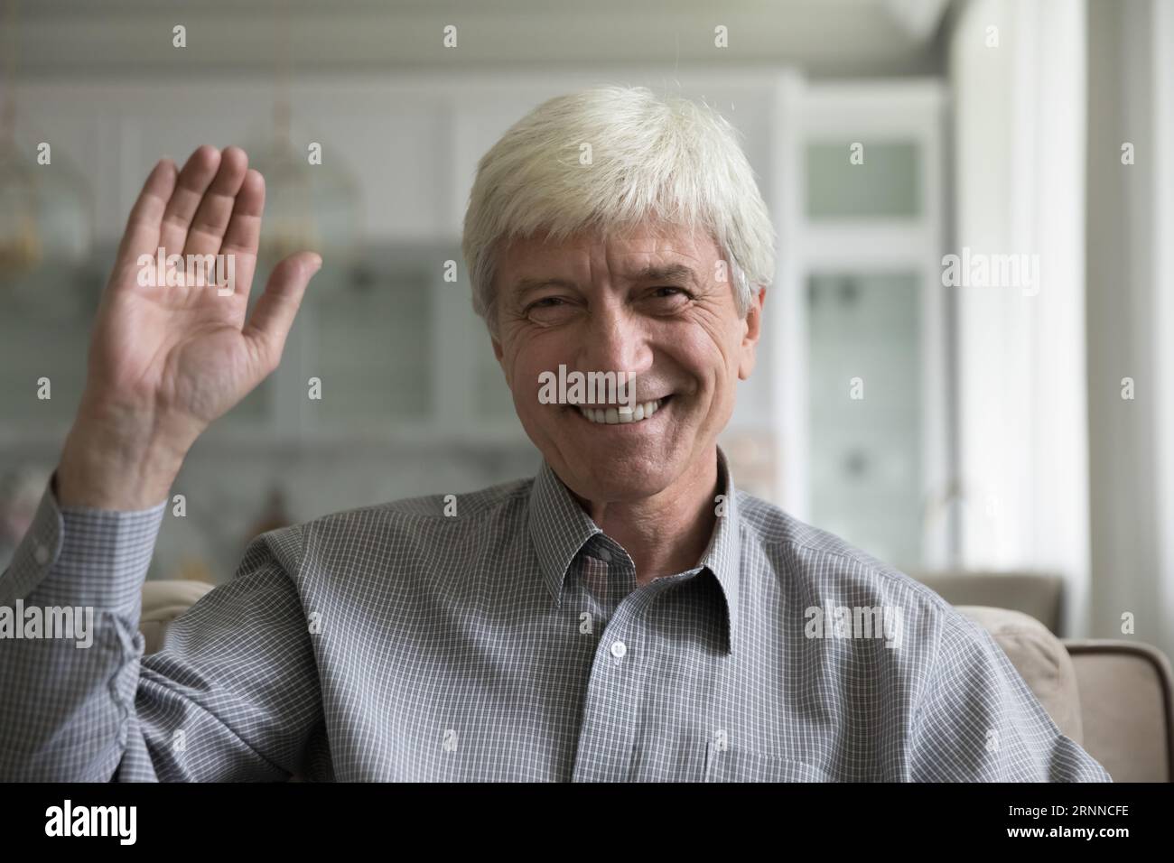 Happy older man waving hi-res stock photography and images - Alamy