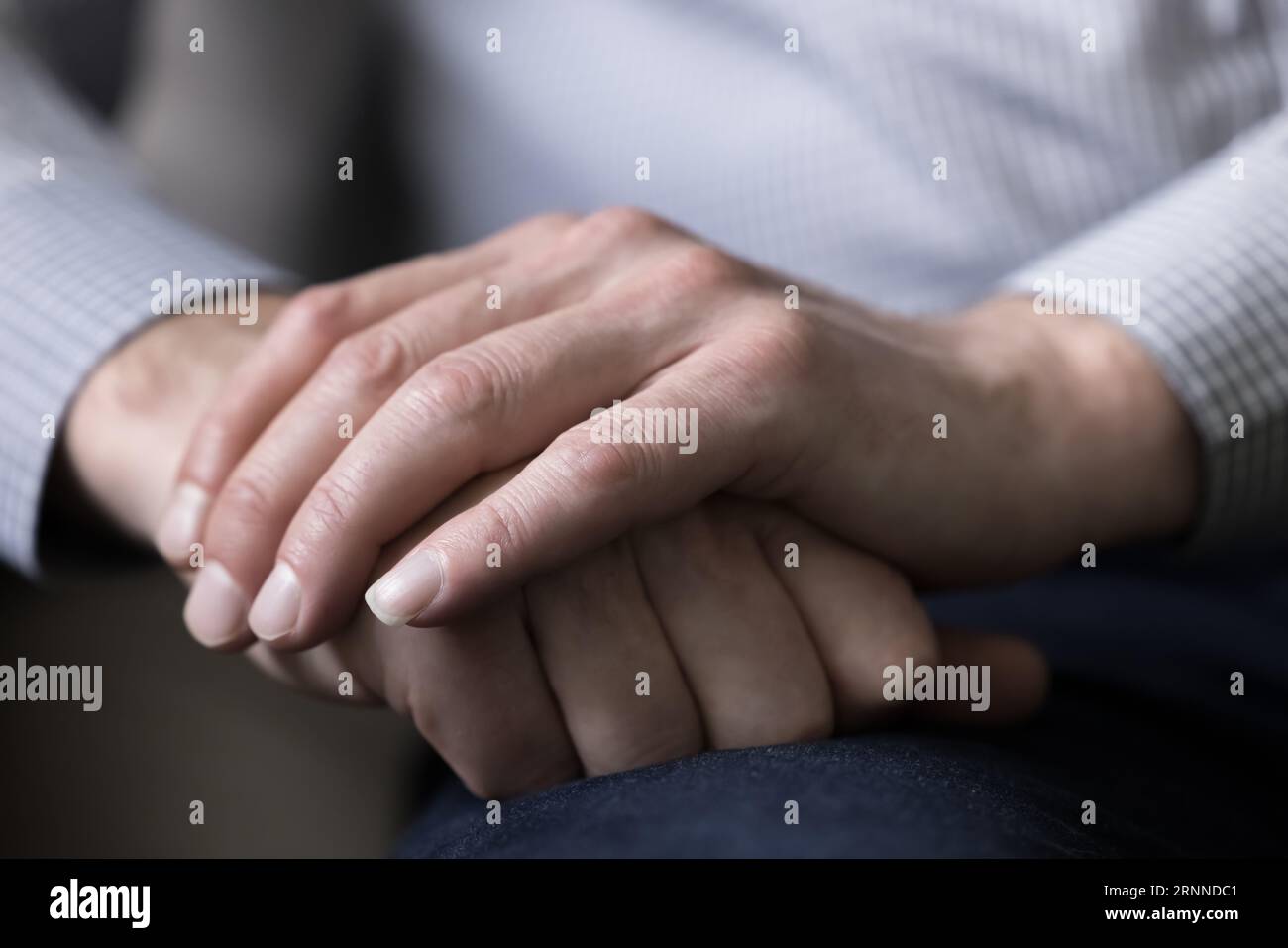 Mature elderly man stacking hands, folded palms with manicure Stock ...