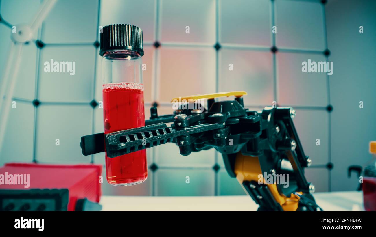 a robot holds a sample of a chemical substance the concept of using ...