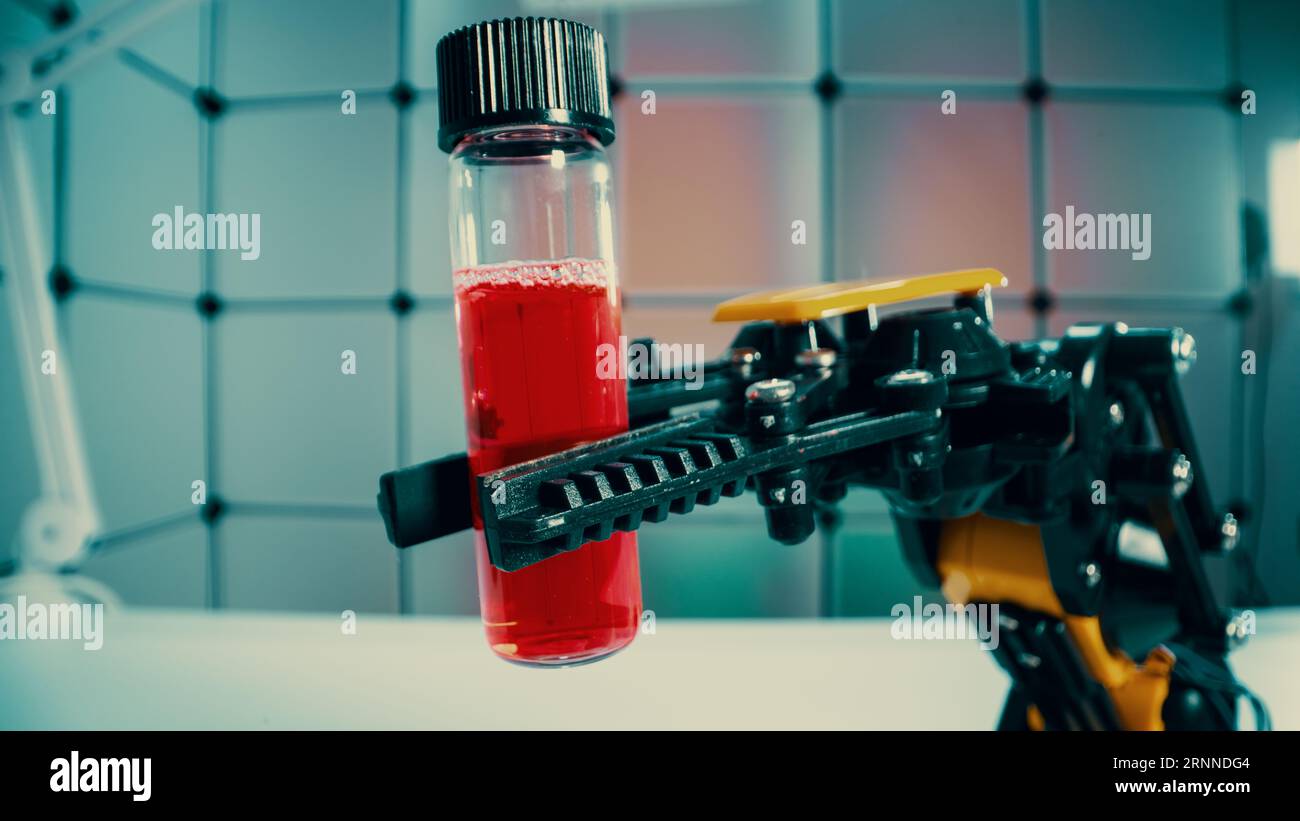 a robot holds a sample of a chemical substance the concept of using ...
