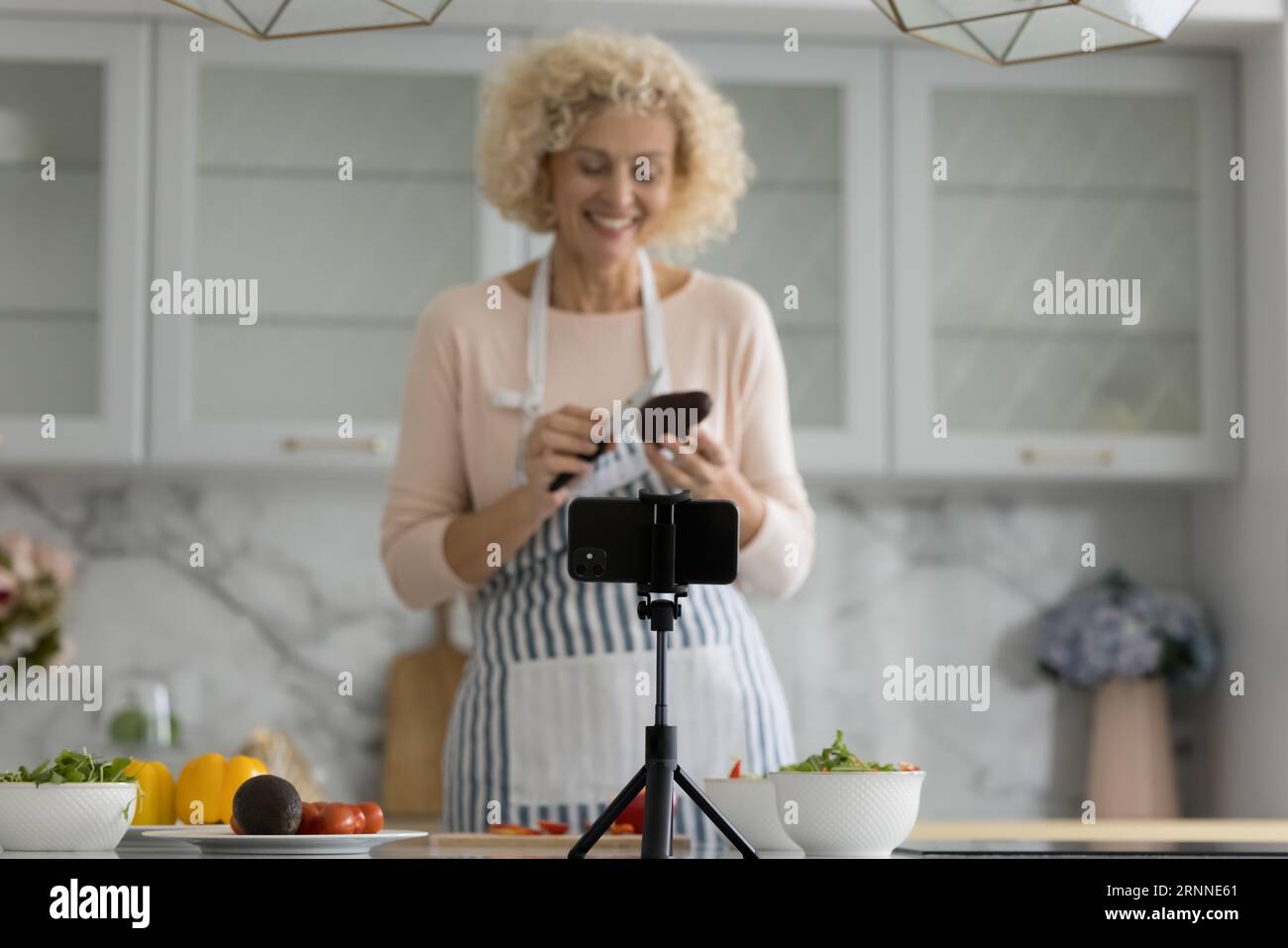 Woman filming food vlog smartphone hi-res stock photography and images ...