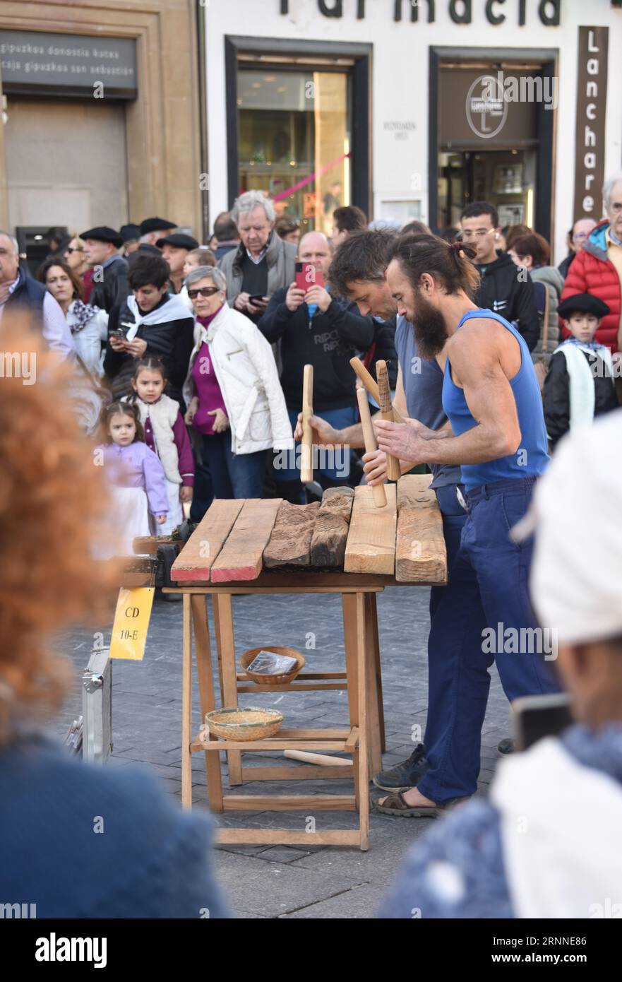 San Sebastian, Spain - Dec 21, 2022: Musicians playing the Txalaparta ...