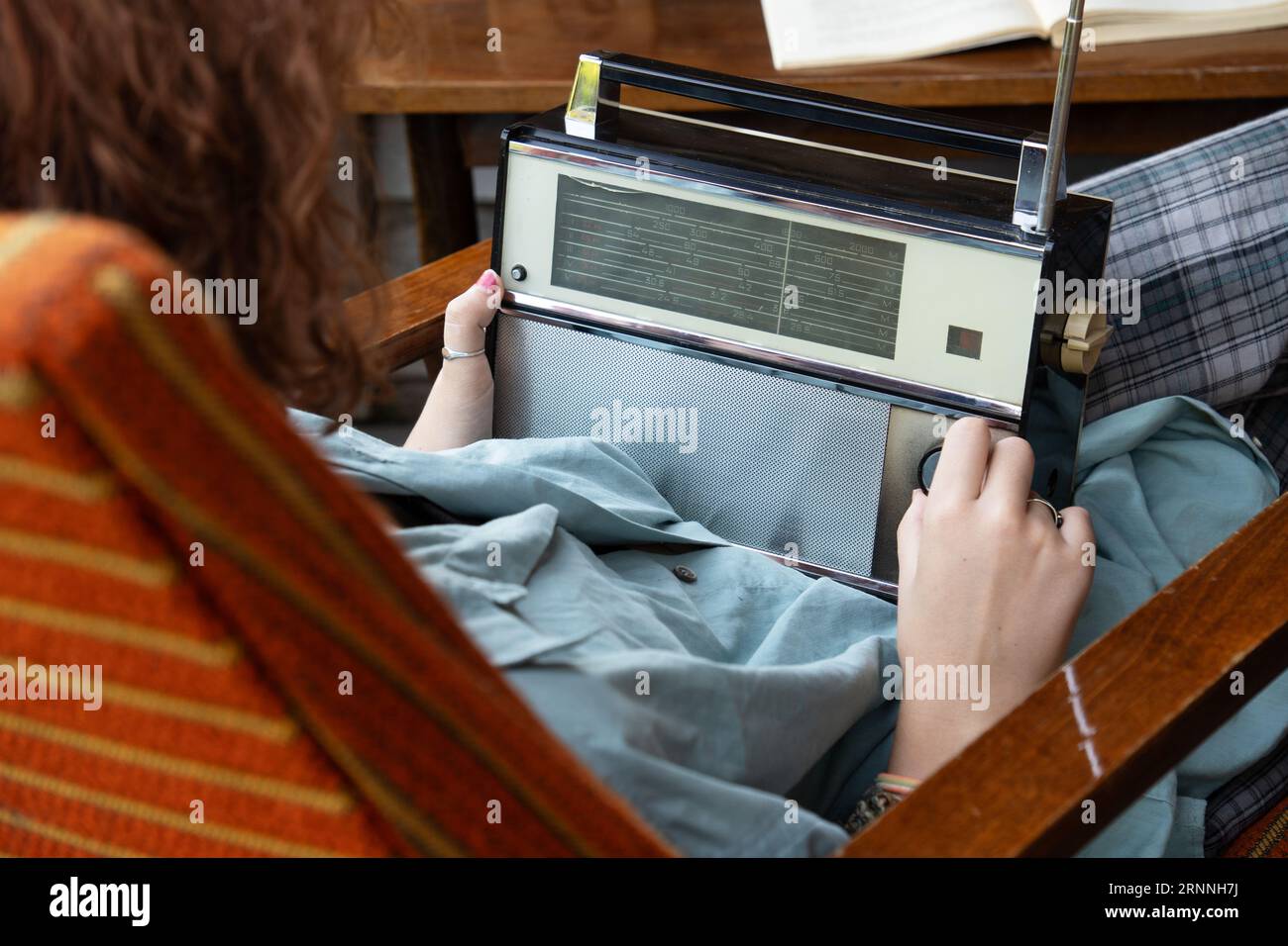 Searching for a radio station frequency or wave on a vintage radio ...