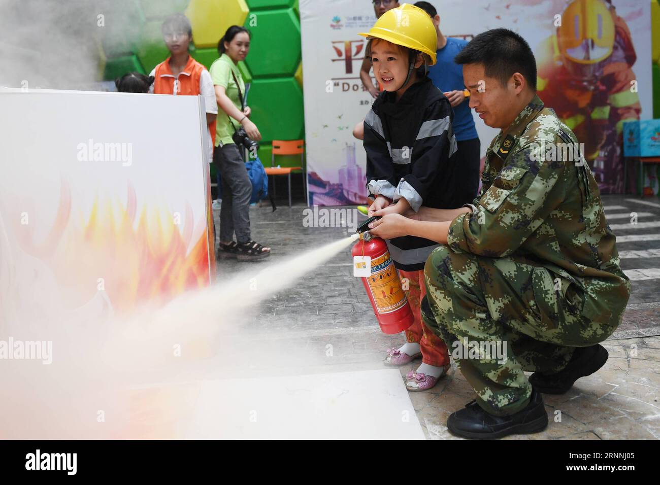 Children fire extinguisher hi-res stock photography and images - Alamy