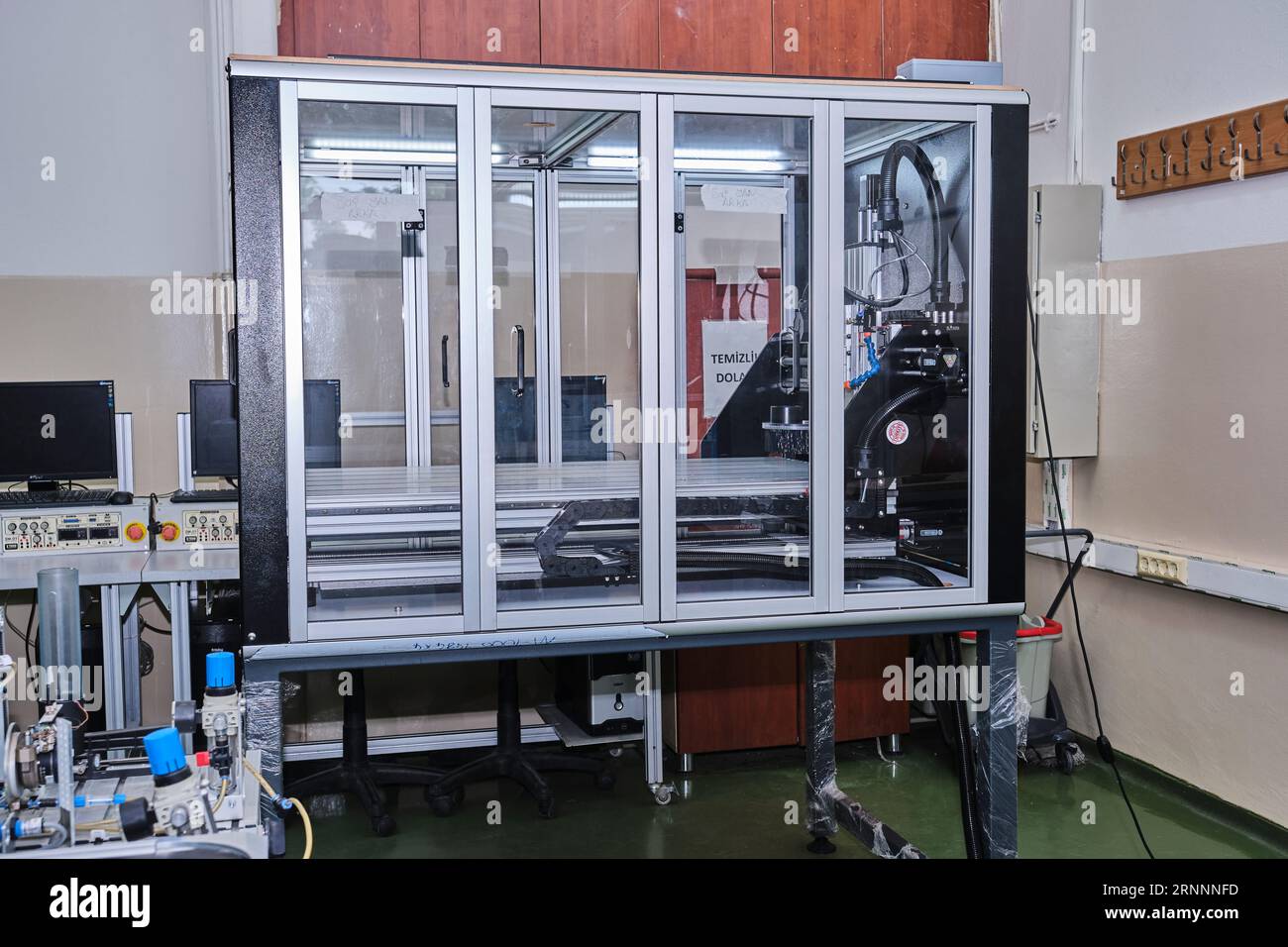 Big 3d printing machine in a workshop. 3D printing machine on a stand ...