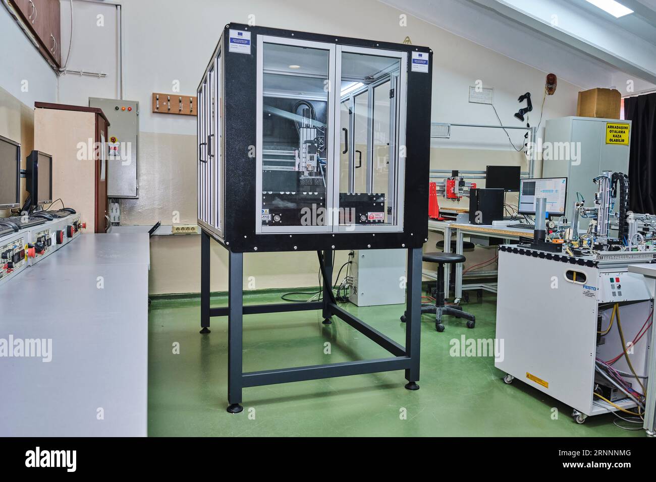 Big 3d printing machine in a workshop. 3D printing machine on a stand ...