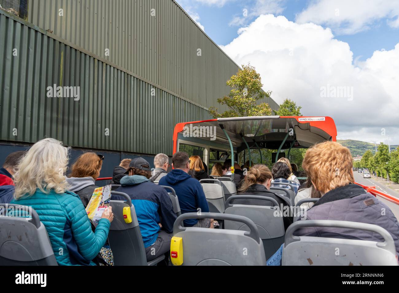 People on the Belfast tour bus at the Peace Wall, Cooper Way, Belfast ...