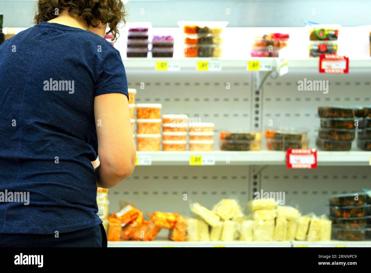 buyer at the grocery store. The girl in shopping mall. The customer ...