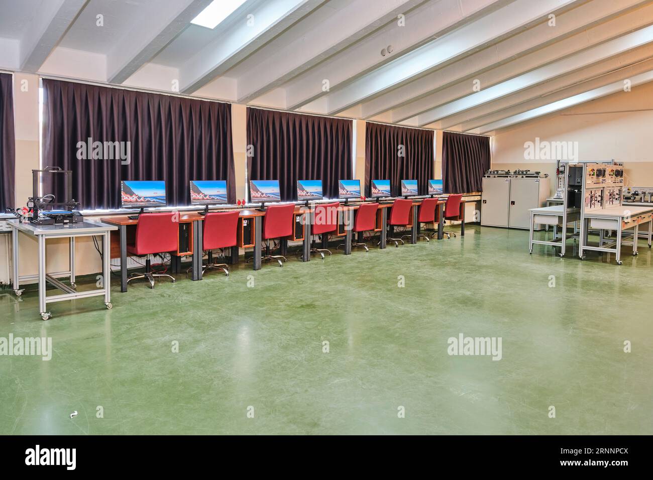 empty computer lab in a university. Computer lab room. room with a lot ...