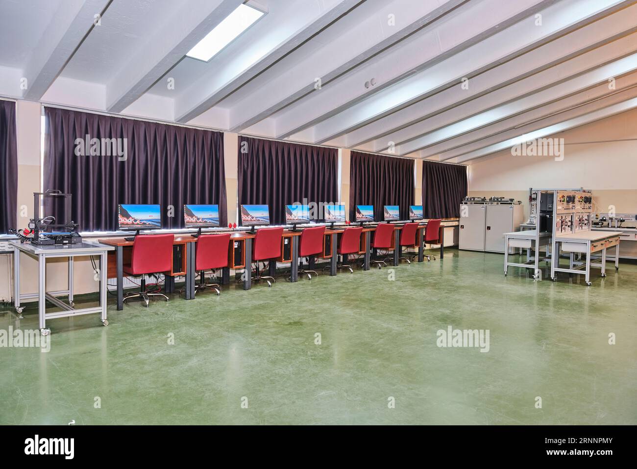 empty computer lab in a university. Computer lab room. room with a lot ...