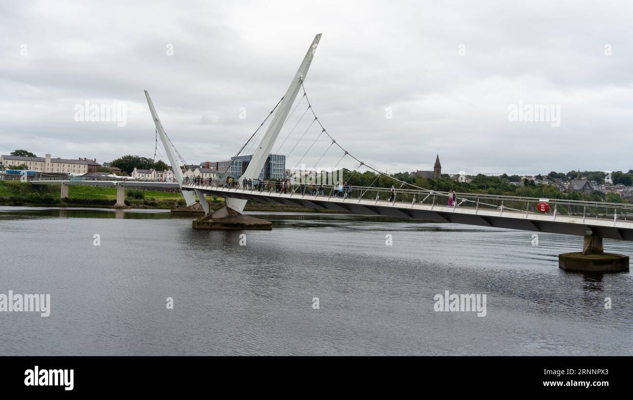 The Peace Bridge over the River Foyle in the city of Derry ...