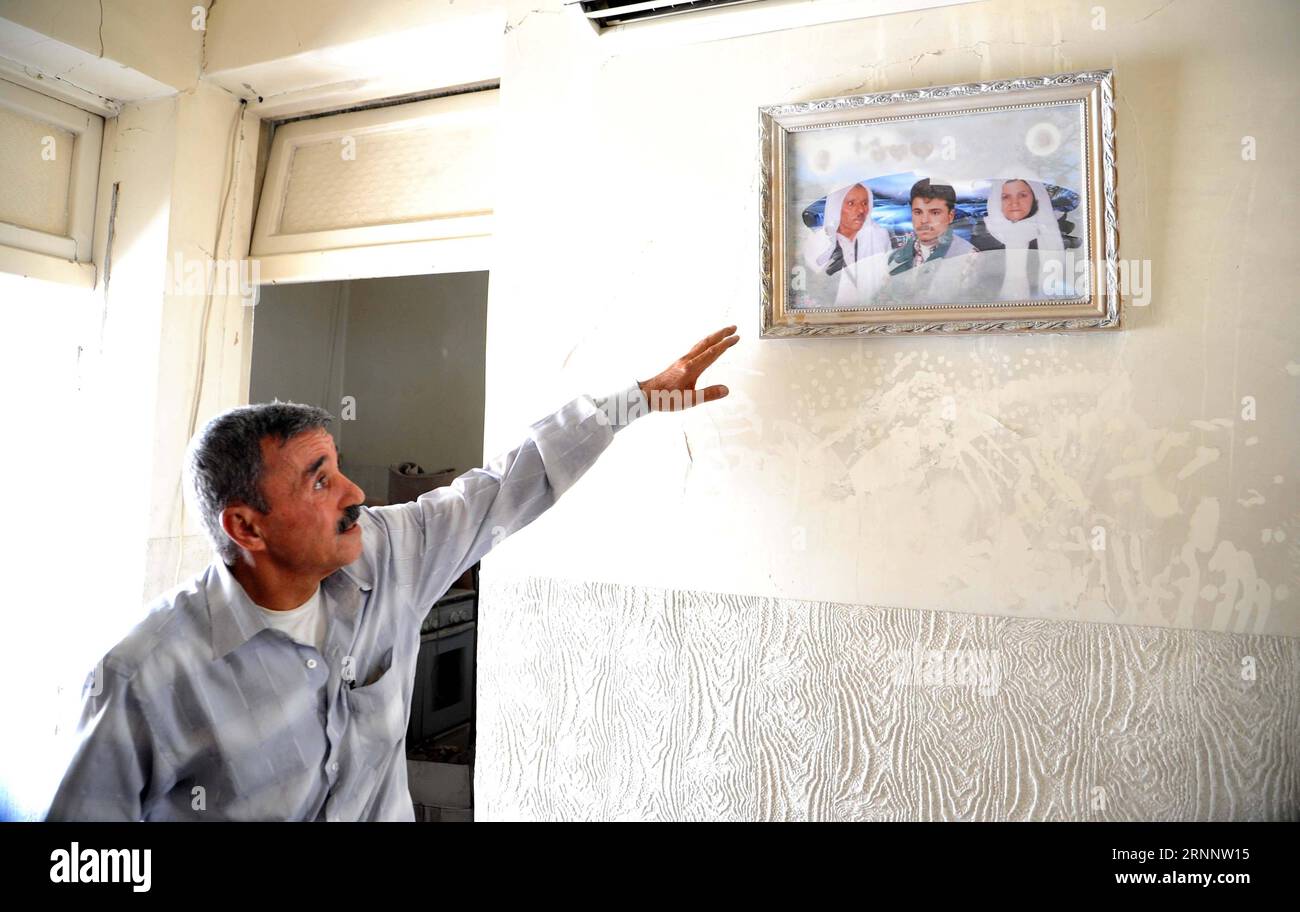 (170729) -- ALEPPO (SYRIA), July 29, 2017 -- Muhammad Deeb, 65, points ...