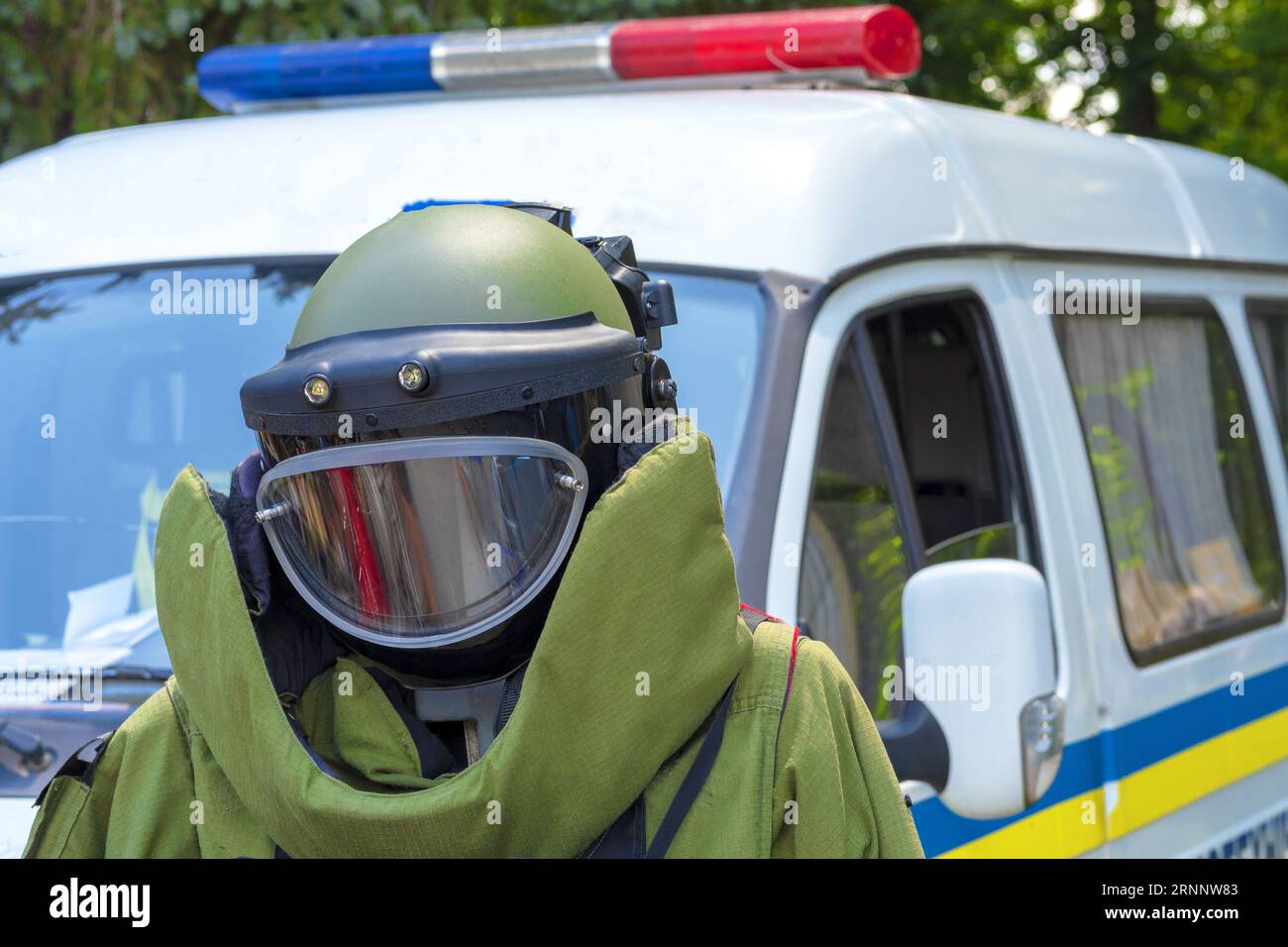 Armor costume consisting of a steel helmet. The concept of demining of ...